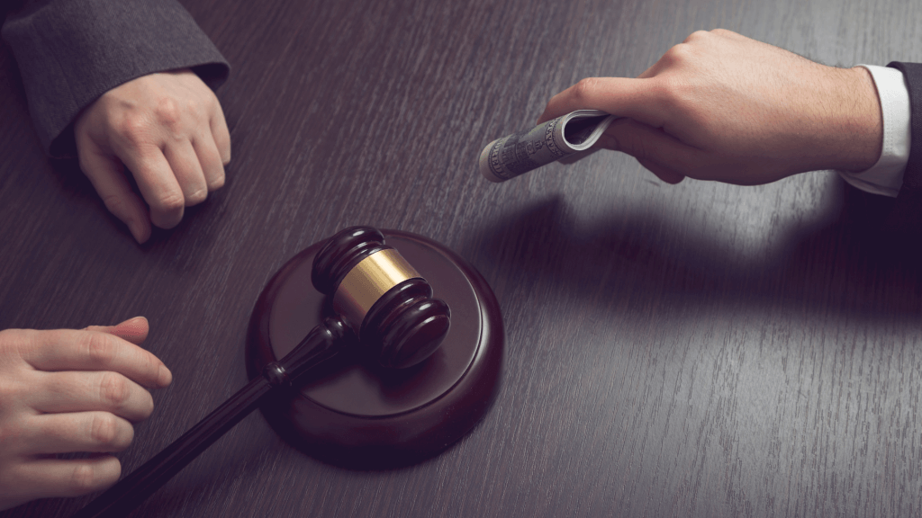 Bribery charges. Corruptly paying government officials